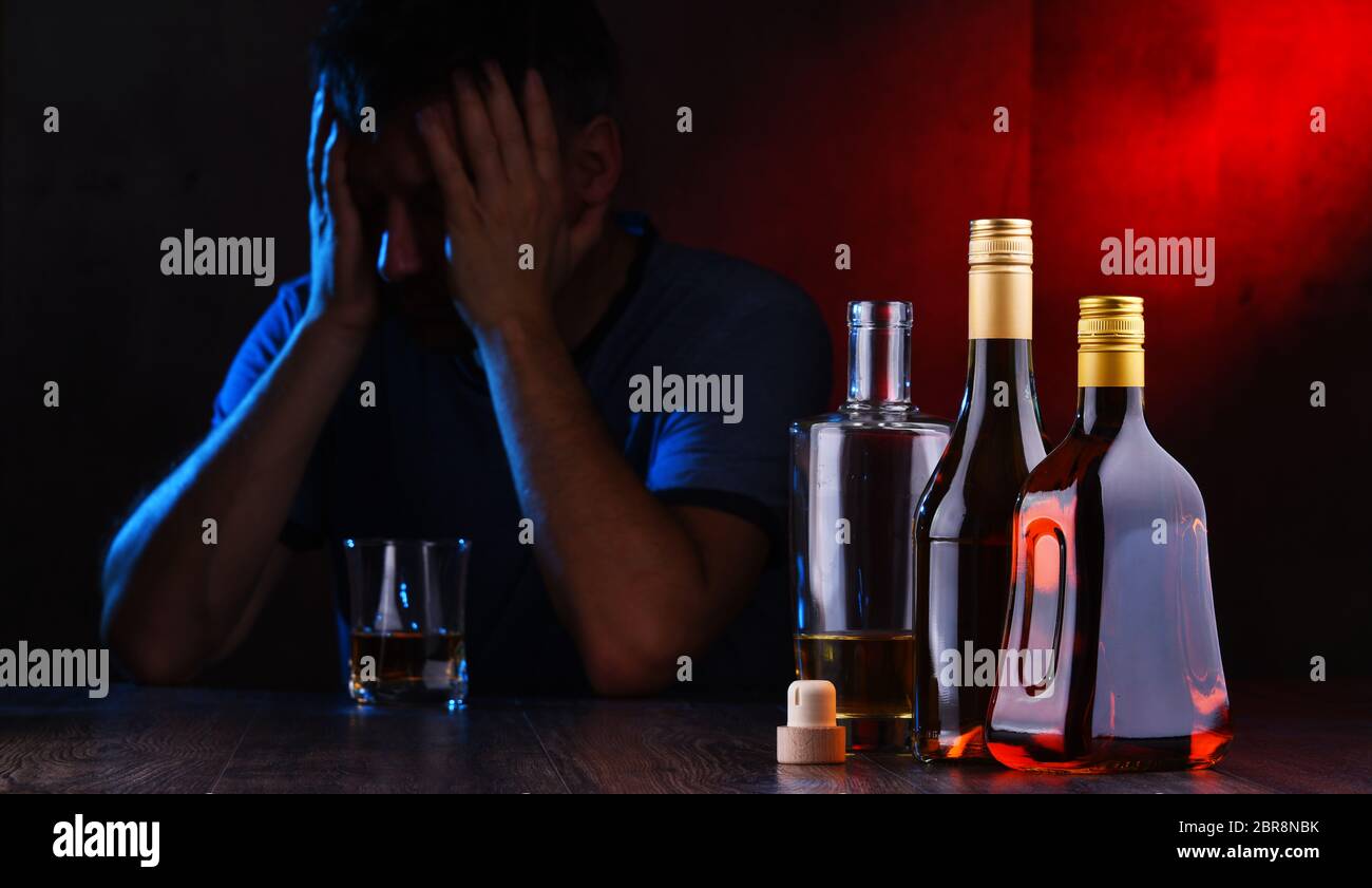 Bottles with alcoholic beverages and the figure of a drunk man Stock ...