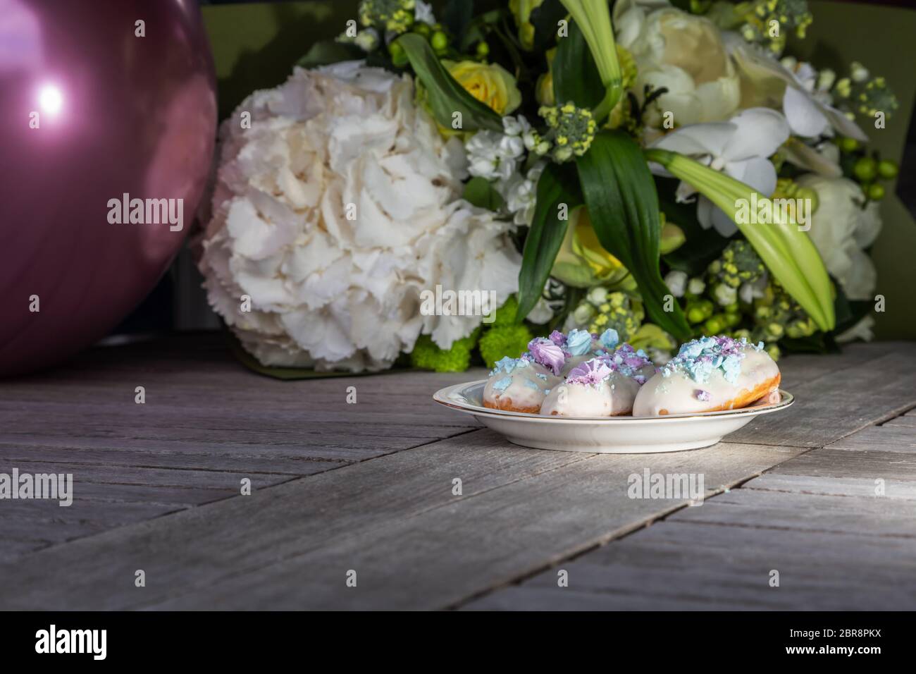 Traditional french eclairs is typically piped into an oblong shape with ...