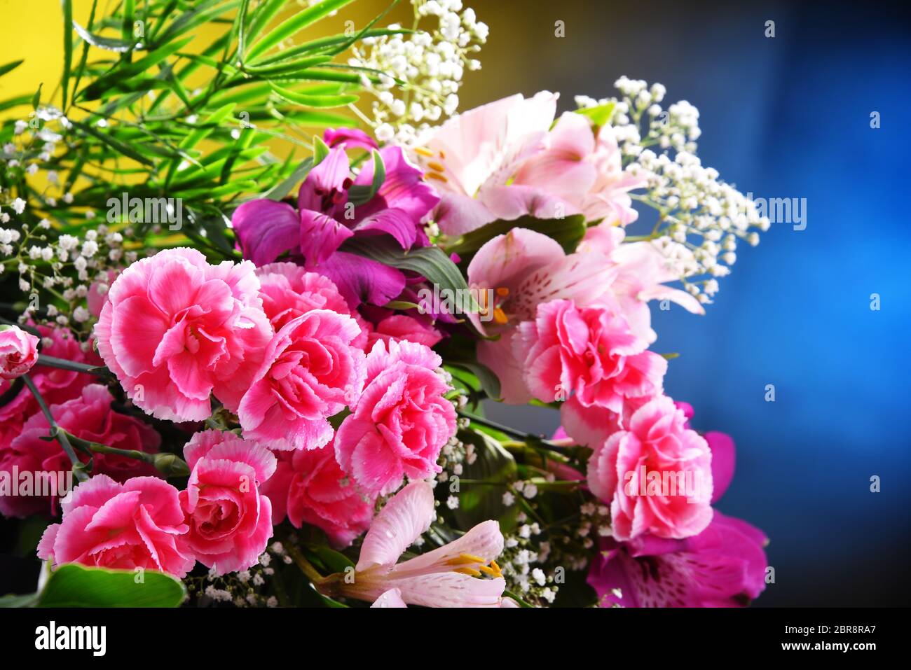 Composition with bouquet of freshly cut flowers Stock Photo - Alamy