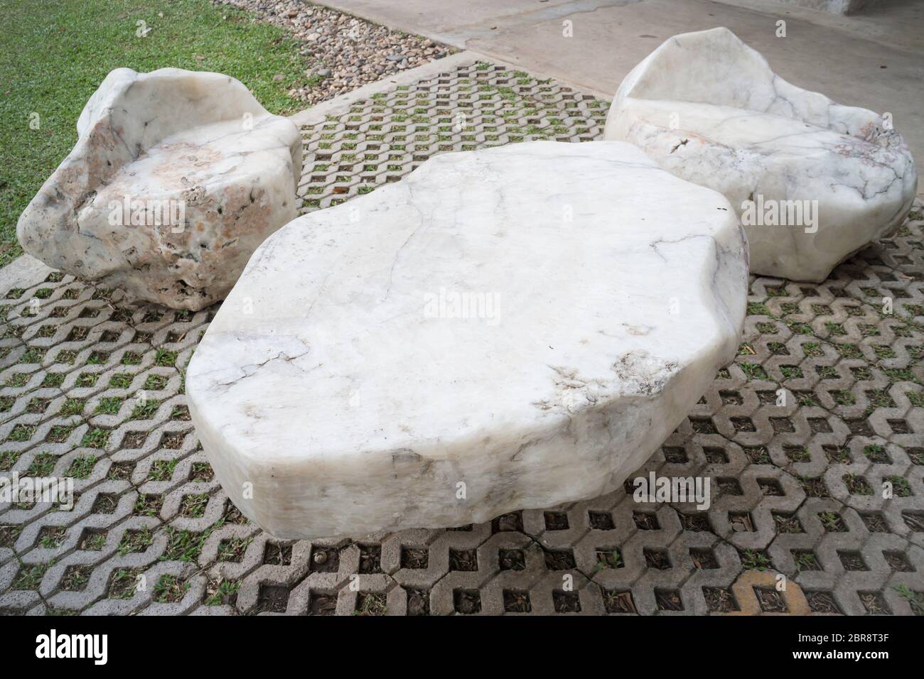 Stone seat in outdoor garden, stock photo Stock Photo - Alamy