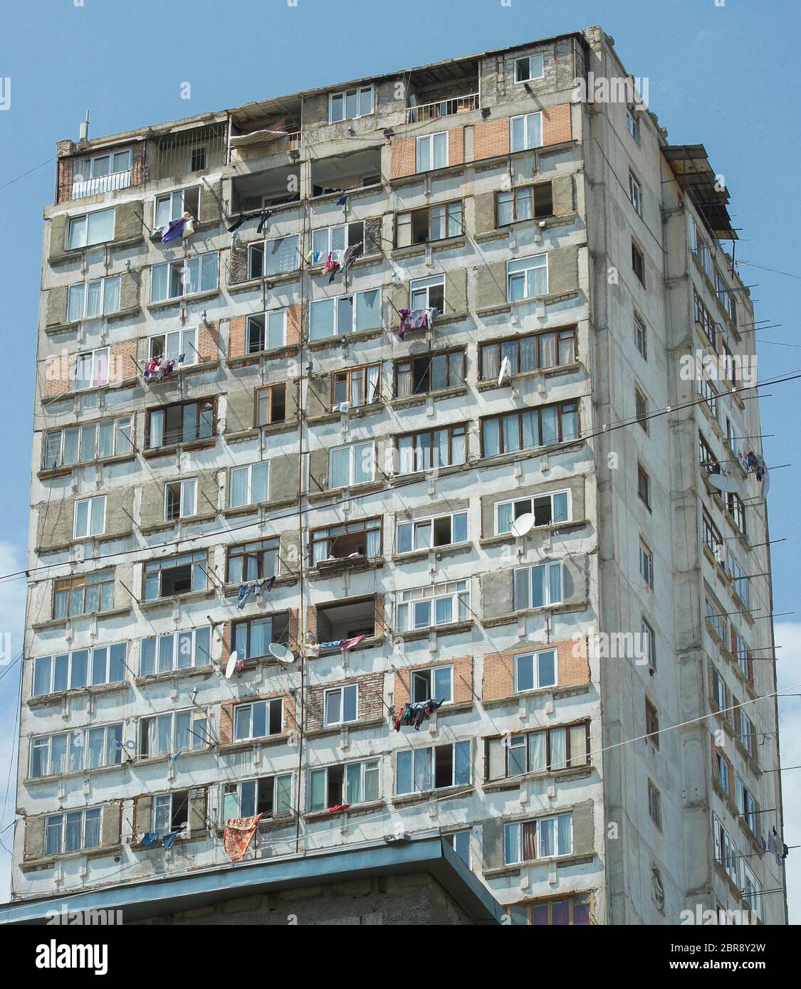 Suburb of the capital city with run-down apartment buildings in Tbilisi ...