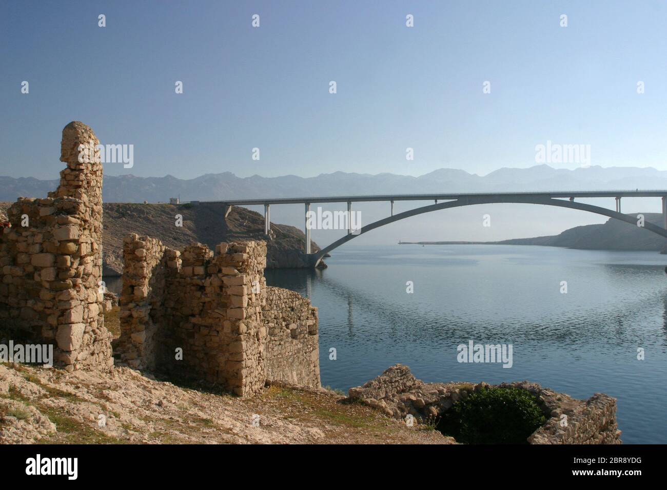 Ancient ruins and bridge over the sea Stock Photo - Alamy