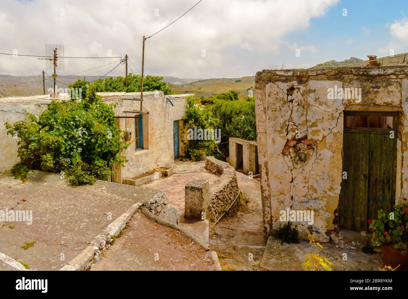 Old abandoned town. Narrow street in old Greek village. Traditional ...