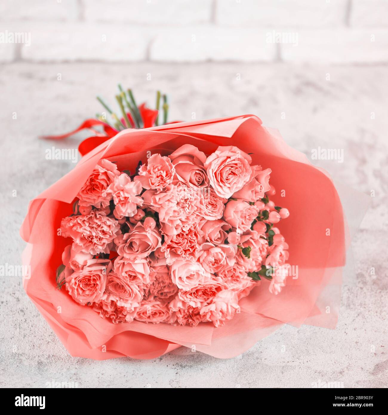 Beautiful bouquet with roses, dianthus, hypericum, clove in color of ...