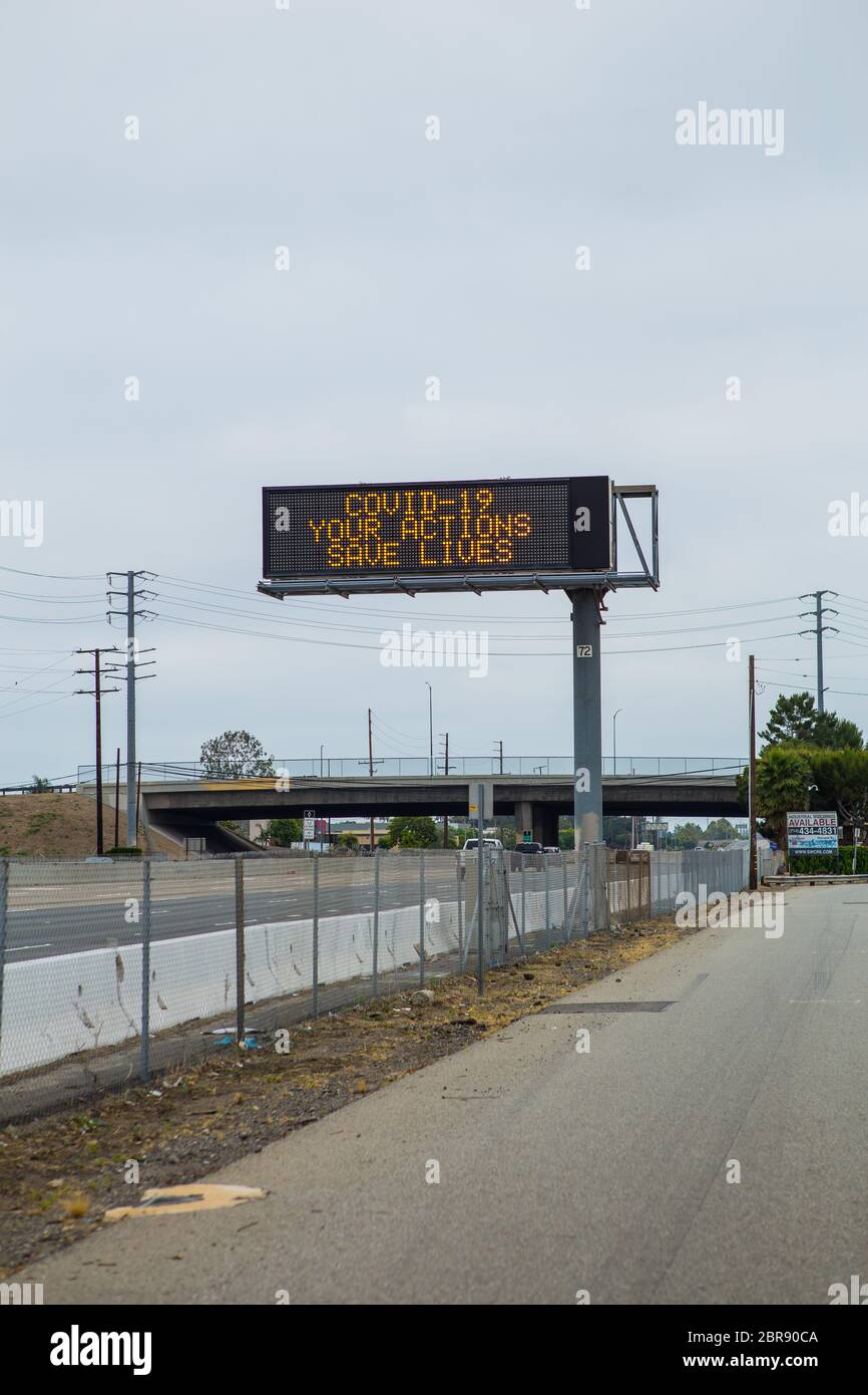 Coronavirus Covid-19 sign on the 55 freeway warning motorists your ...
