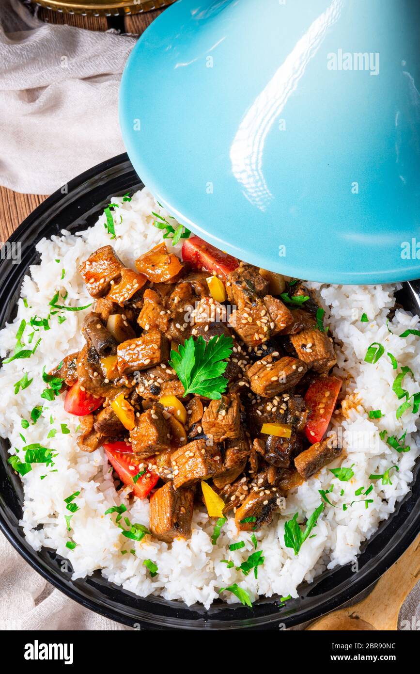 Tajin beef stew with rice paprika and sesame seeds Stock Photo - Alamy
