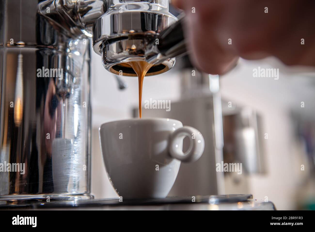 porta filter espressomachine in front of bright background Stock Photo ...