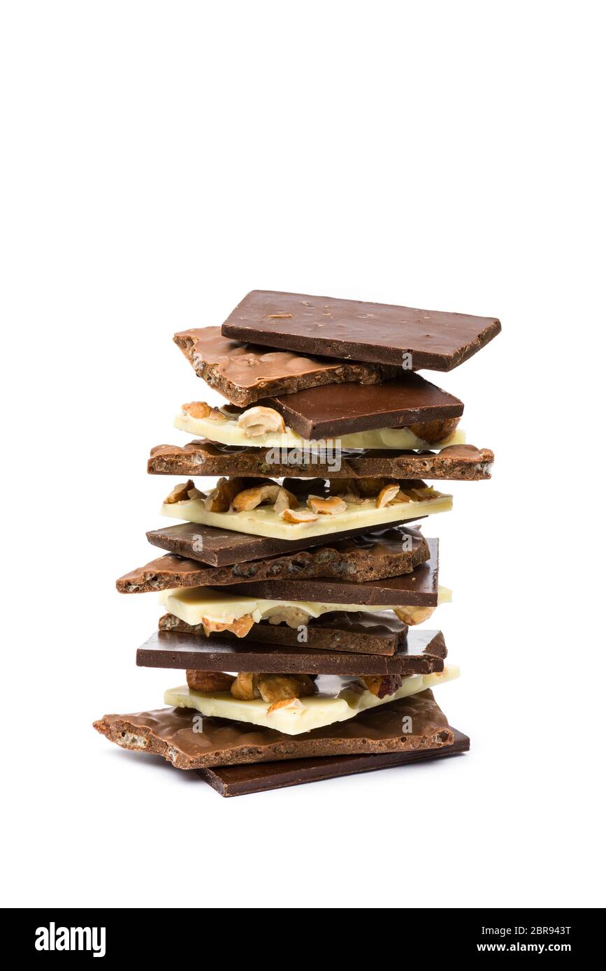 pile of mixed chocolate pieces, on white background Stock Photo - Alamy