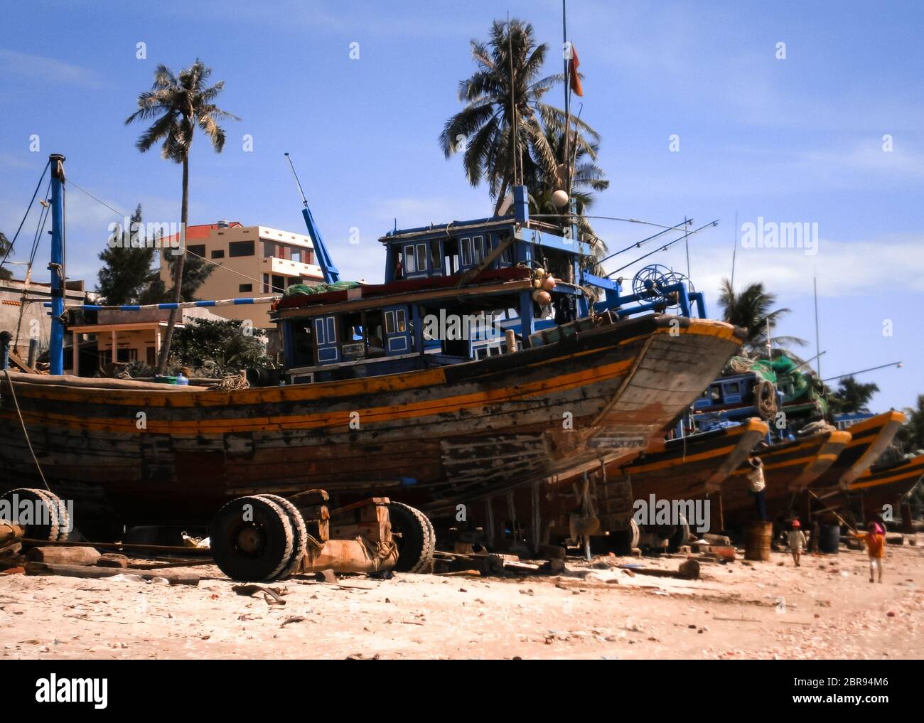 A few big boats on a beach Stock Photo - Alamy