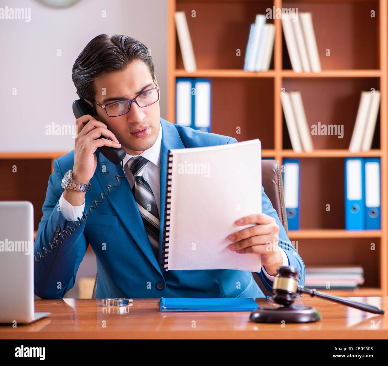 The lawyer working in the office Stock Photo - Alamy