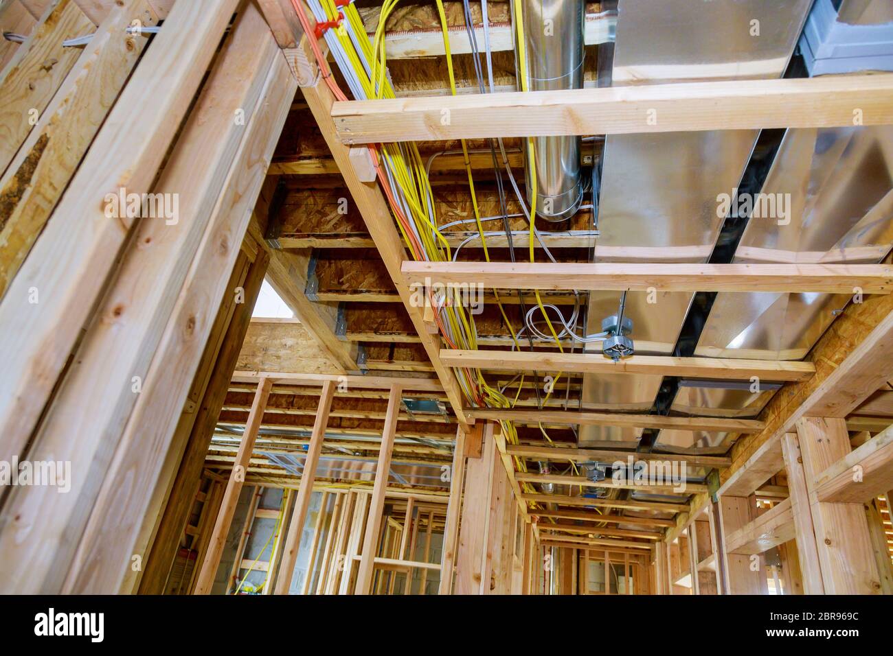 Framed residential home with basic rough pipe system of heating ...