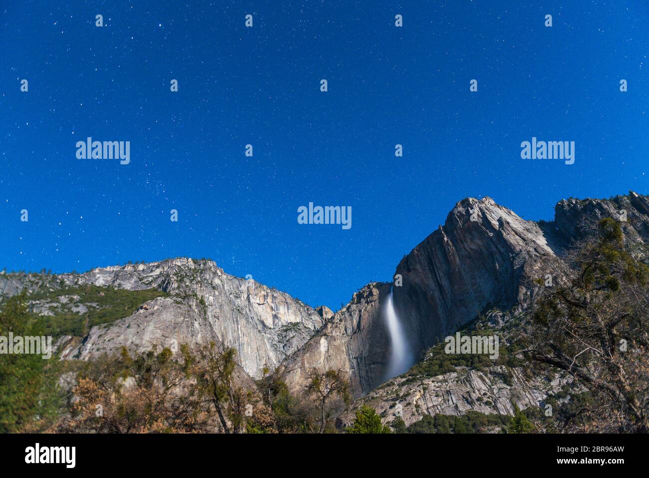 scene of upper fall with sky and star at night in full moon day ...
