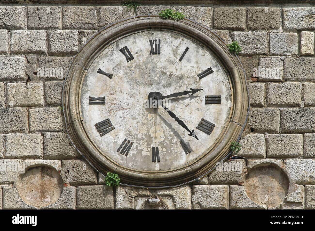 Stone Clock at Medieval Tower in Kotor Montenegro Stock Photo - Alamy