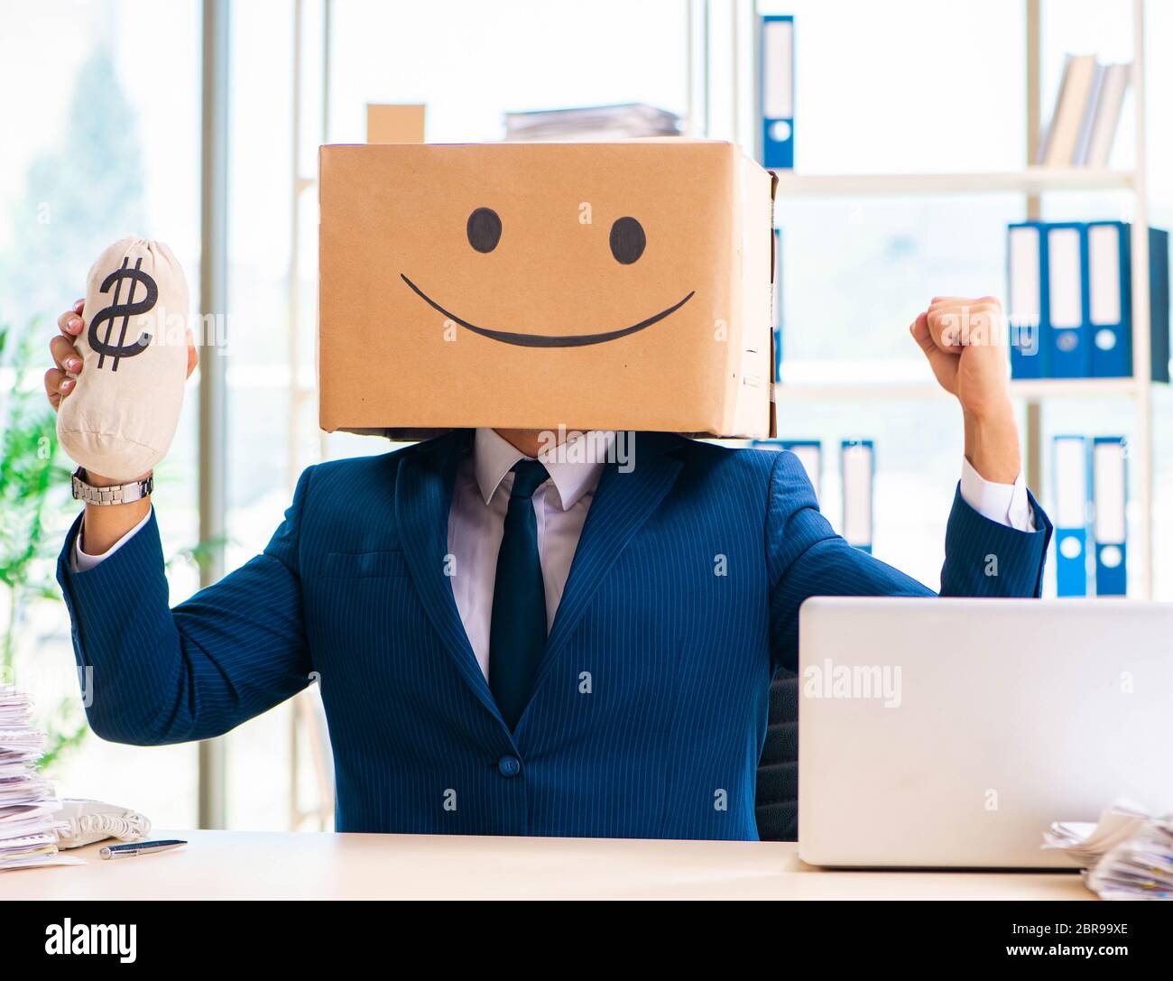 The happy man with box instead of his head Stock Photo - Alamy