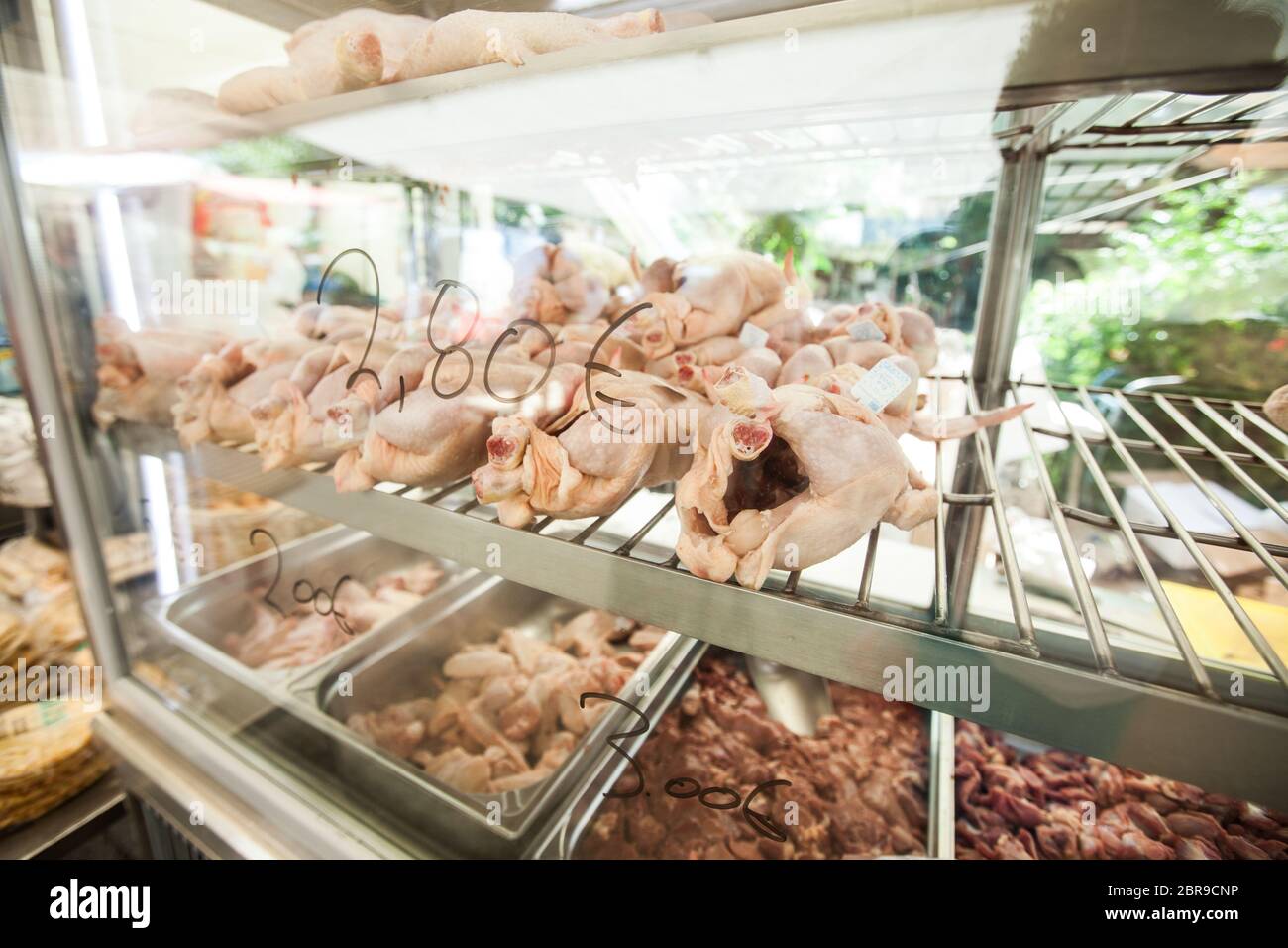 Fresh chicken meat for sale at local food markets Stock Photo - Alamy