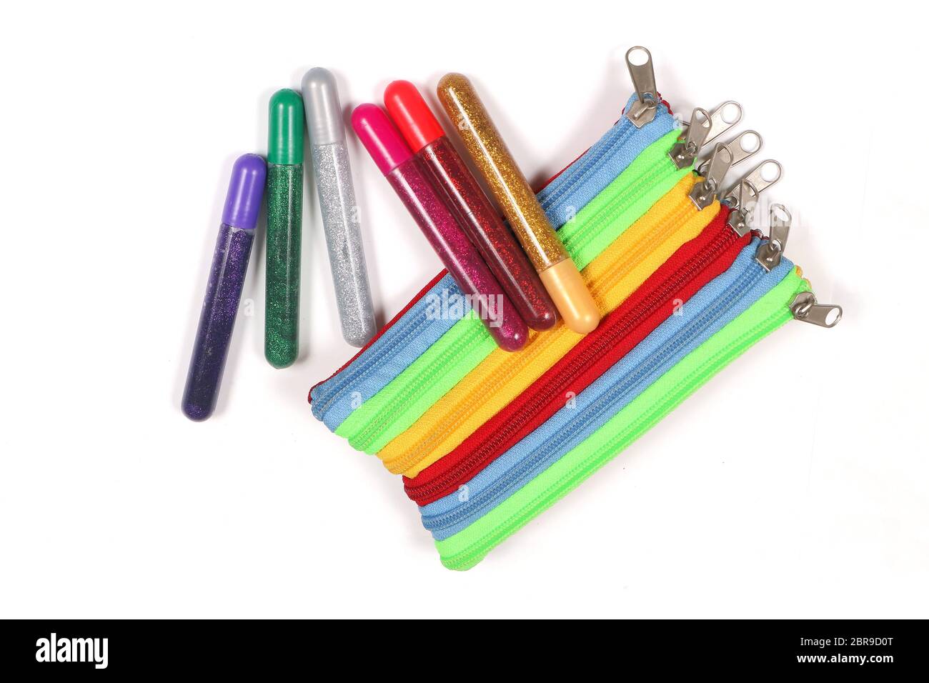 Colorful sparkling shiny pencils with closed zipper case on white ...