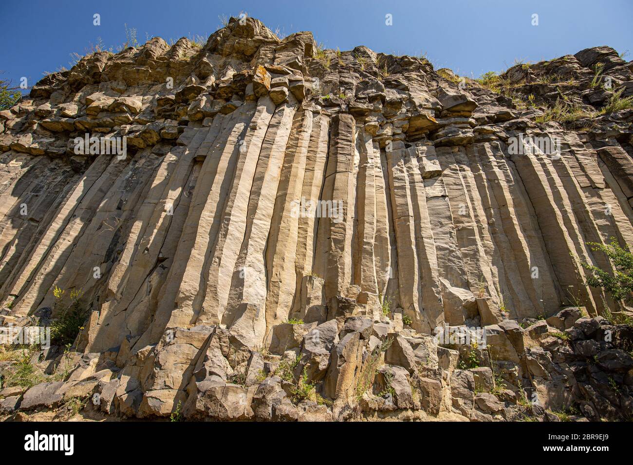 Grey columnar basalt, the columns form due to stress as the lava cools ...