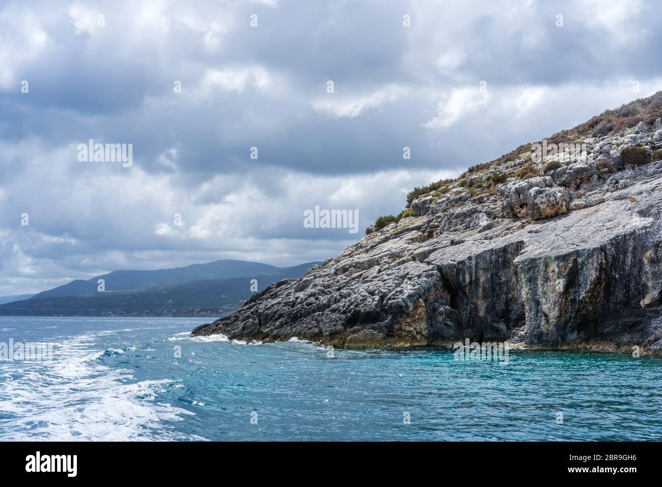 Coastline cliffs near Blue Caves as seen from a tourist boat, Zante ...