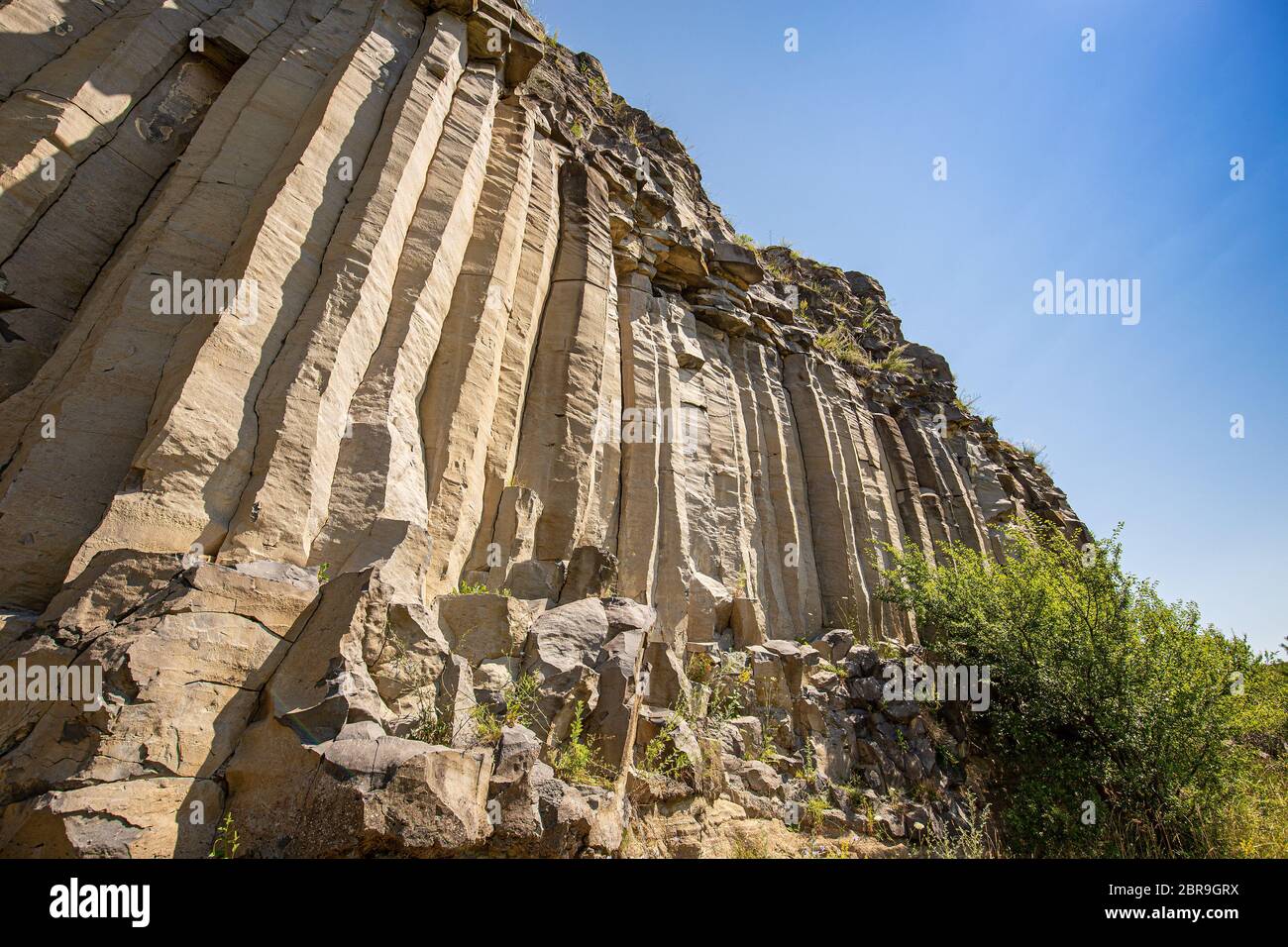 Grey columnar basalt, volcanic basalt coloumn formations Stock Photo ...