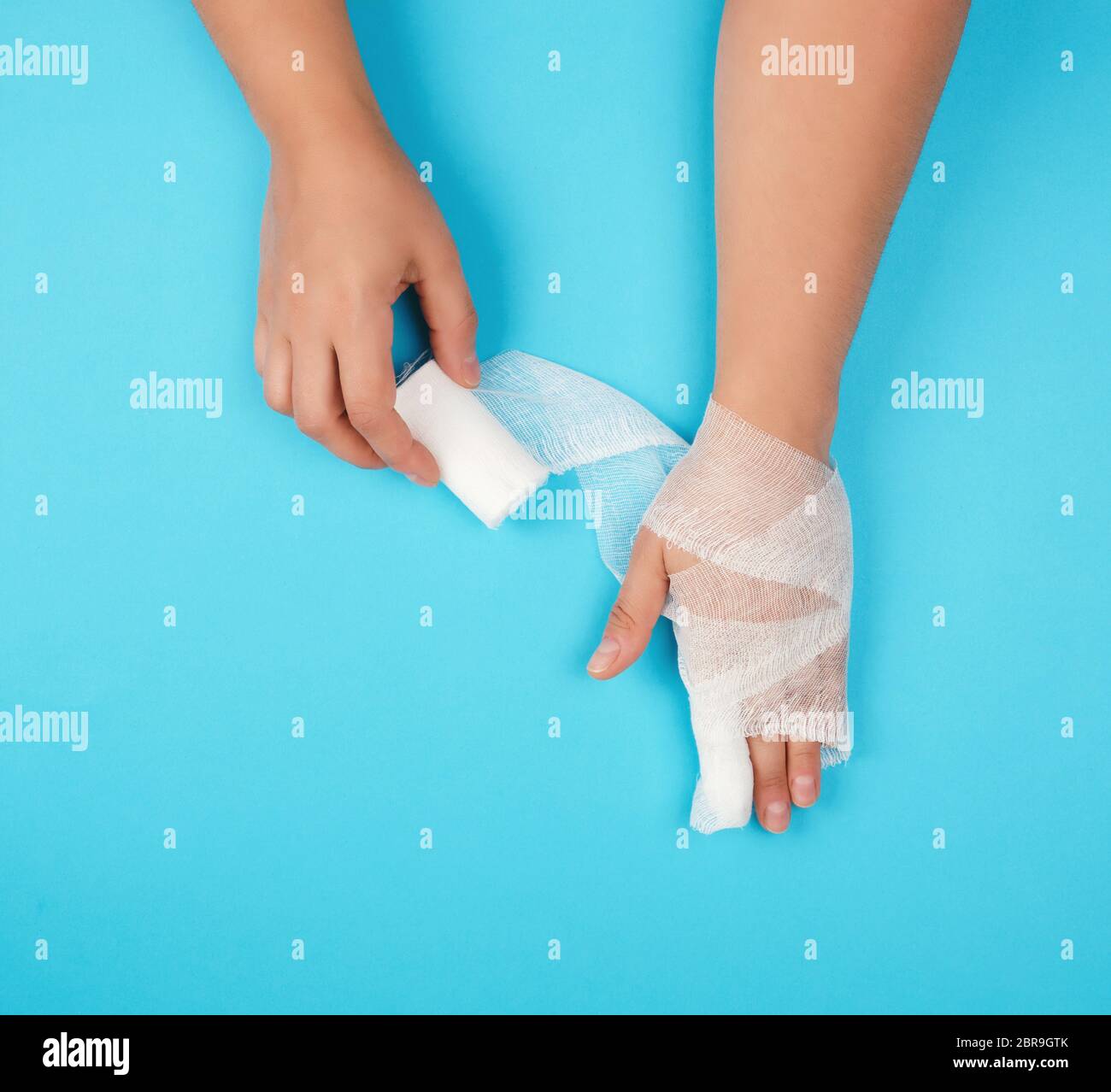 Arm wrapped in a white sterile bandage hi-res stock photography and ...