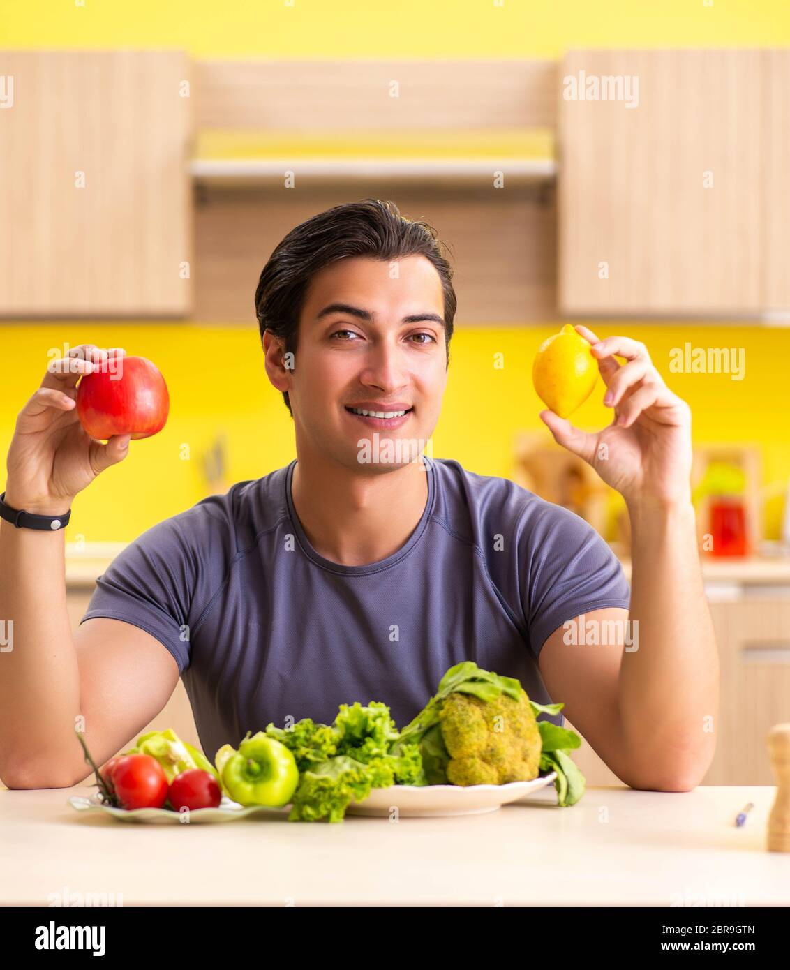 The young man in dieting and healthy eating concept Stock Photo - Alamy