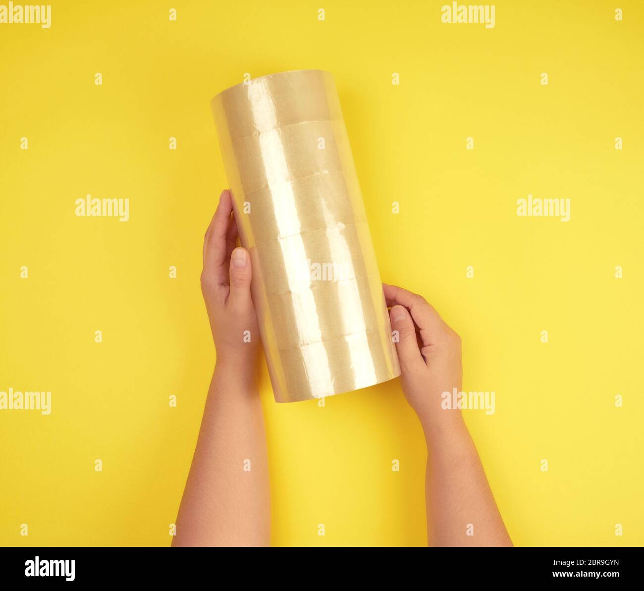 Transparent tape hands hi-res stock photography and images - Alamy