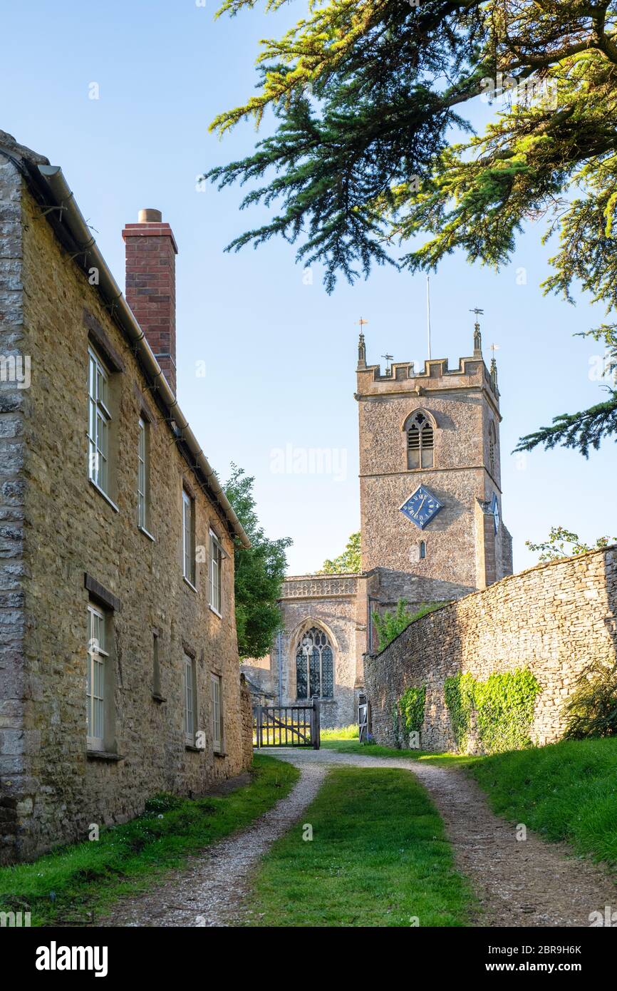 St Laurence church in the early morning spring sunlight. Combe ...