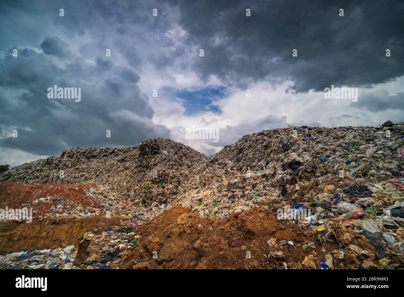 Garbage Dump Hill, landscape with landfill and clouds Stock Photo - Alamy