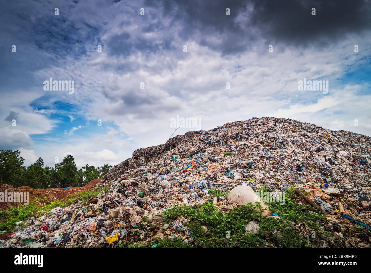 Garbage Dump Hill, landscape with landfill and clouds Stock Photo - Alamy
