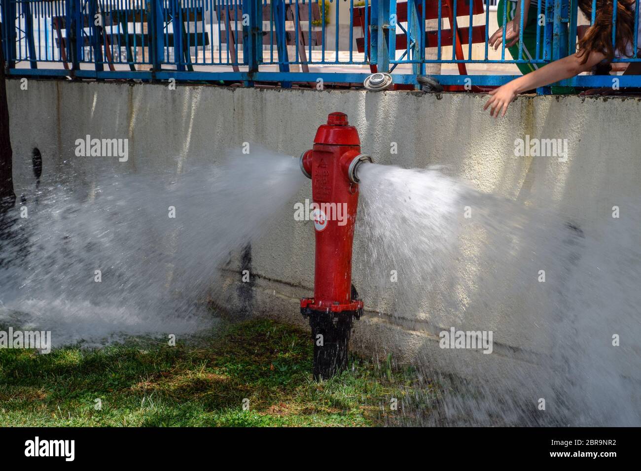 Antalya, Turkey - May 20, 2019: Open fire hydrant, water flows from a ...