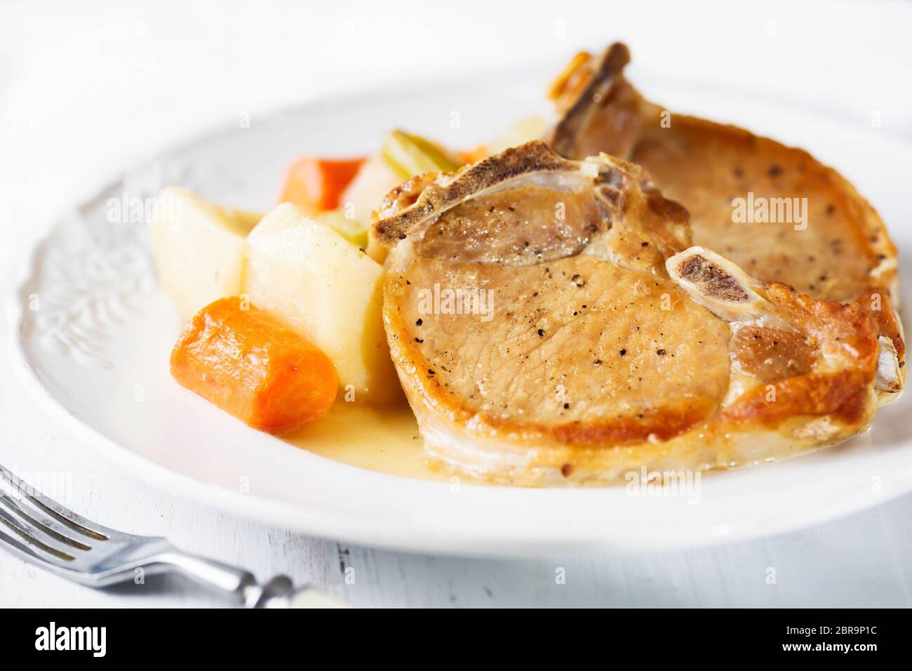 close up of rustic germain braised pork chops Stock Photo - Alamy