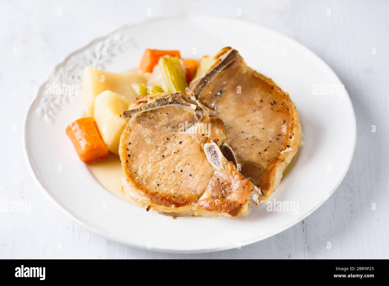 close up of rustic germain braised pork chops Stock Photo - Alamy