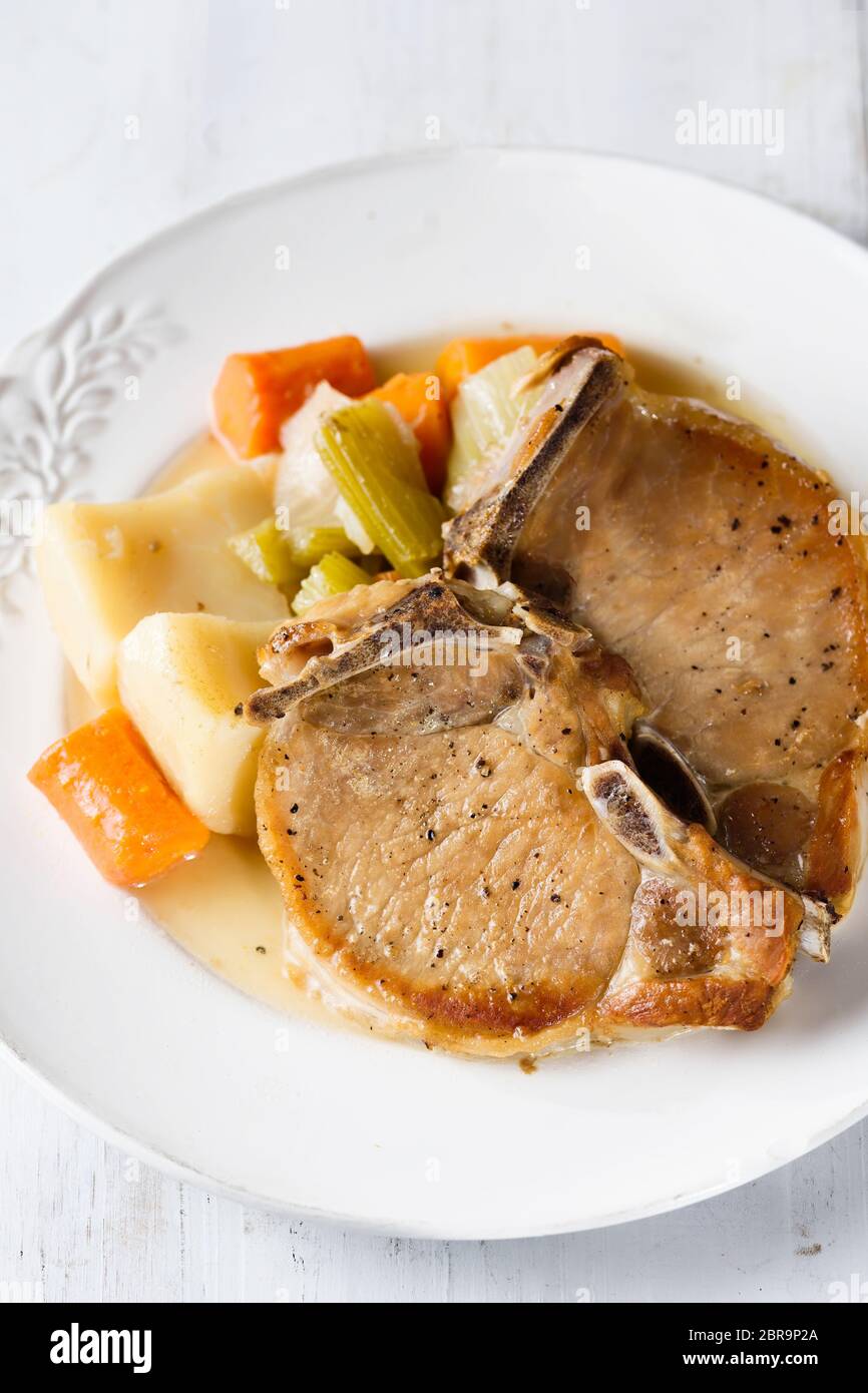 close up of rustic germain braised pork chops Stock Photo - Alamy