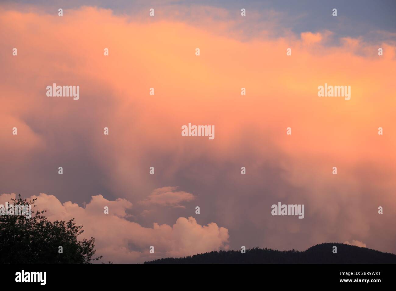 colored sundown in the bavarian alps Stock Photo - Alamy