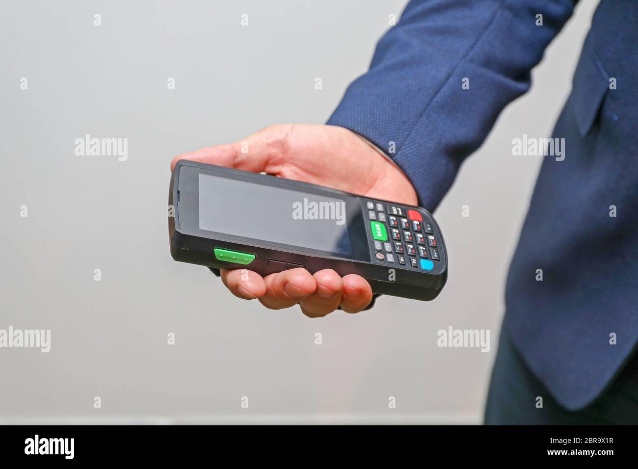 Man Holding Handheld Barcode Scanner Reader Portable Computer Stock ...