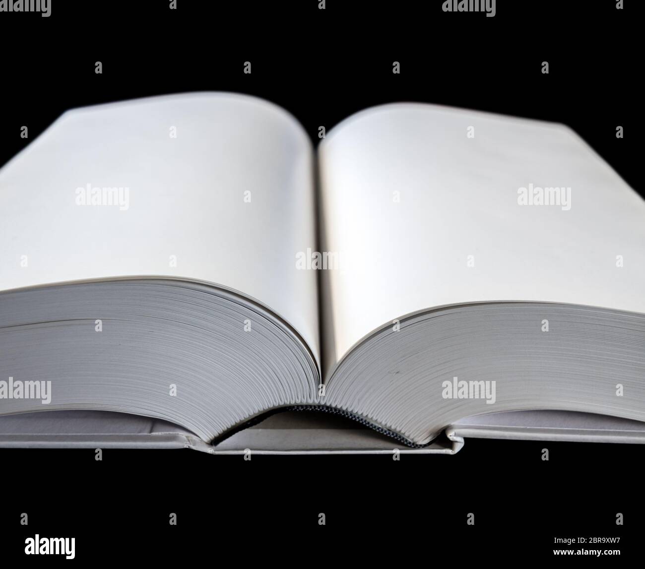 Open blank dictionary, book mockup, black background Stock Photo - Alamy