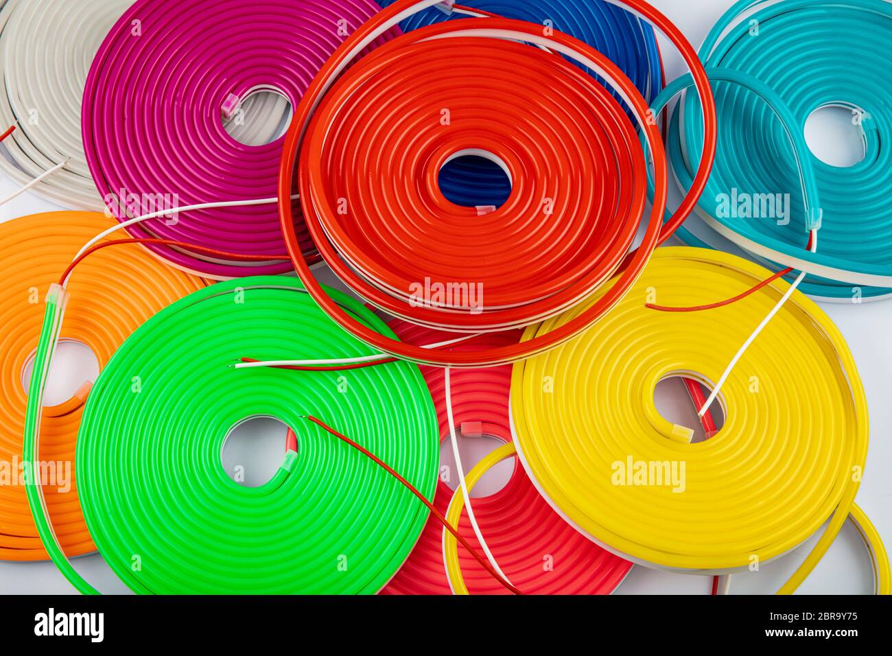 Flexible led tape neon flex in different colors on white background ...