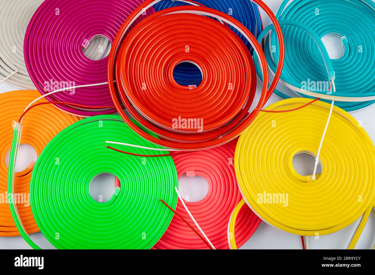 Flexible led tape neon flex in different colors on white background ...