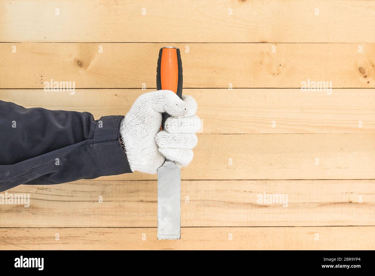 Hand holding chisel hammer hi-res stock photography and images - Alamy