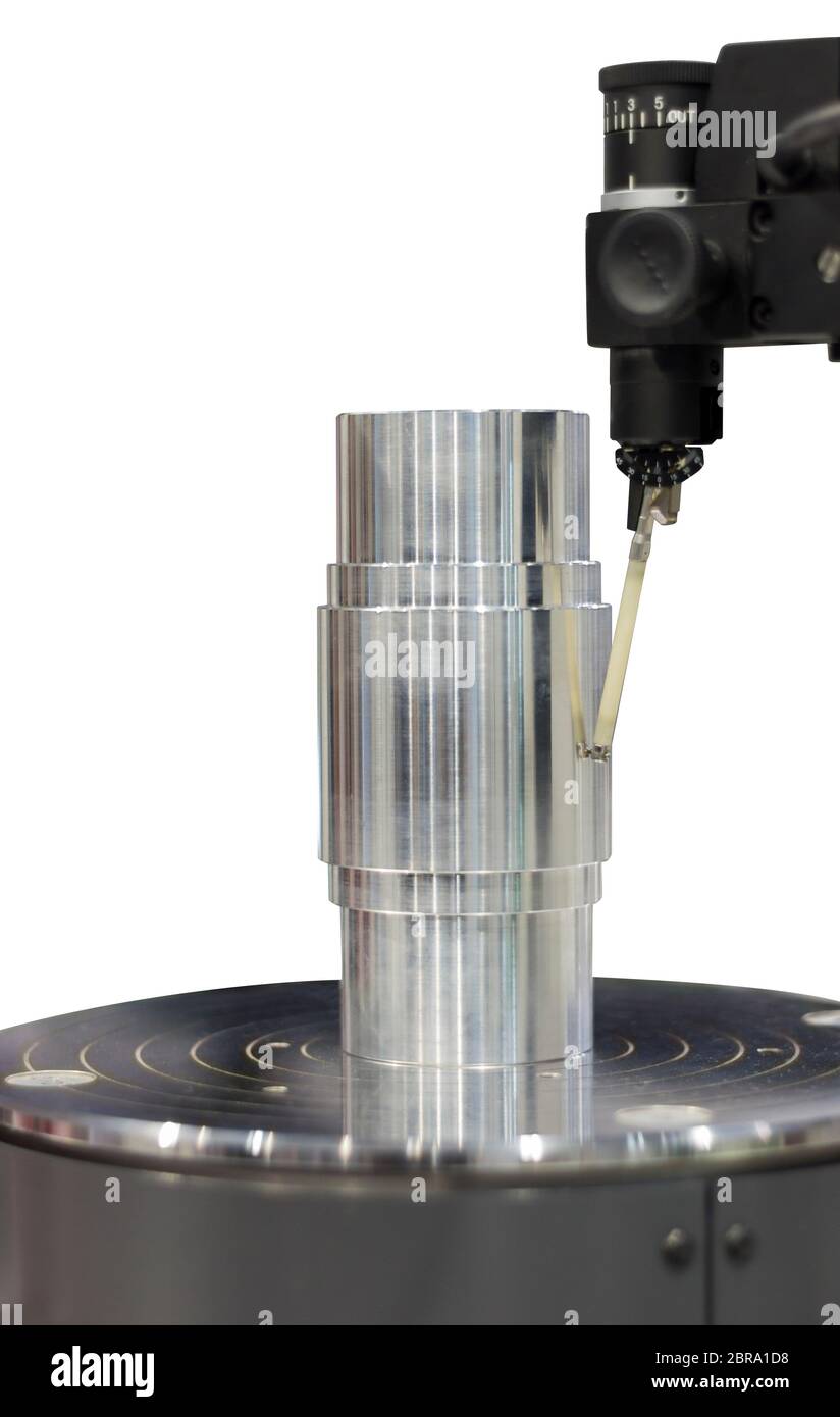 Roundness tester measuring workpiece on turntable ;focus in stylus ...