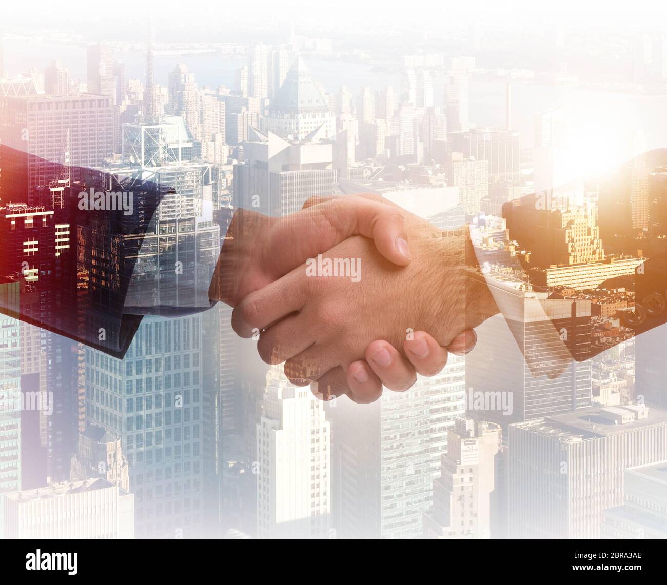 The concept of cooperation with handshake Stock Photo - Alamy