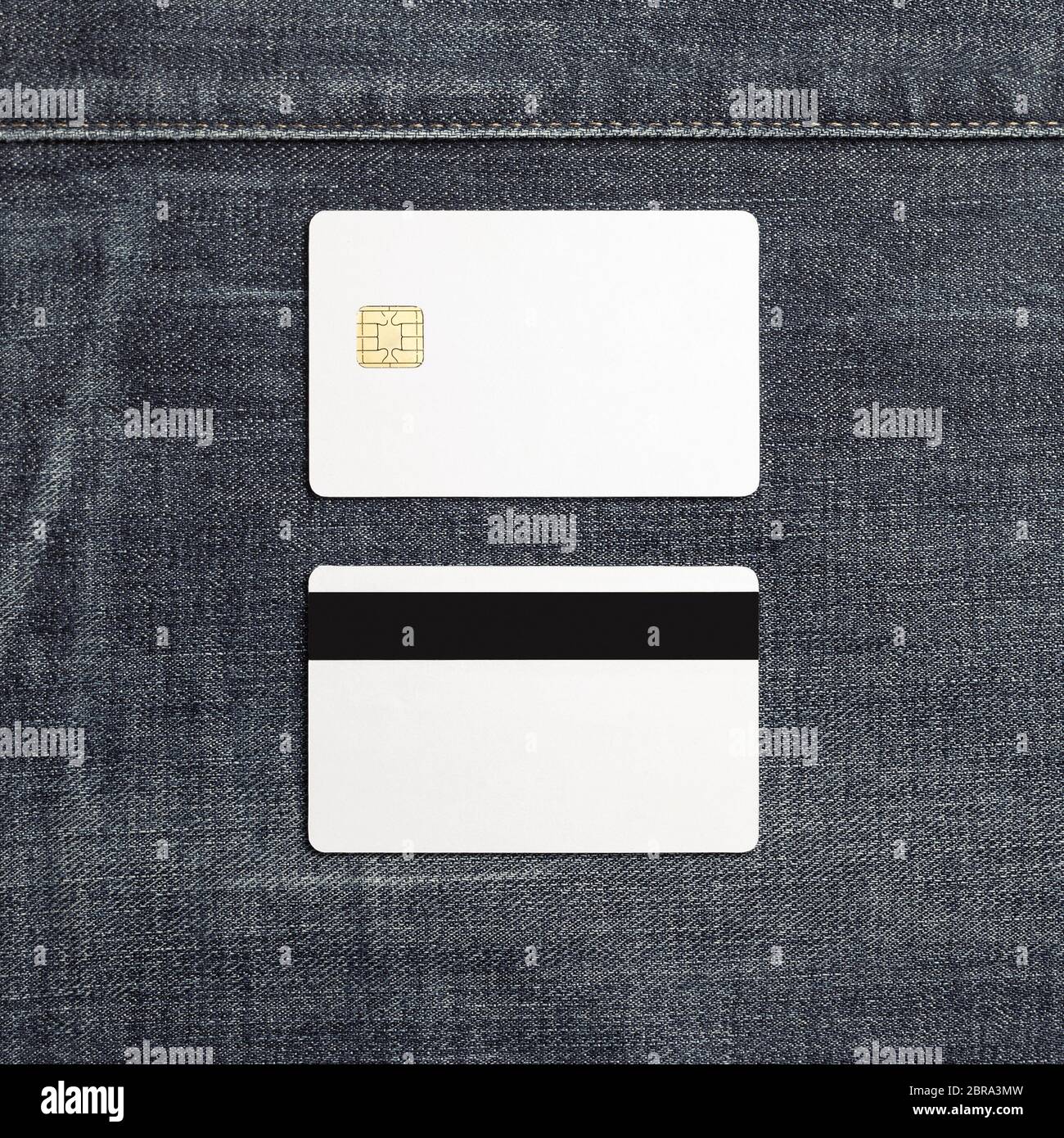 Blank plastic credit cards on denim background. Chip cards. Front and ...