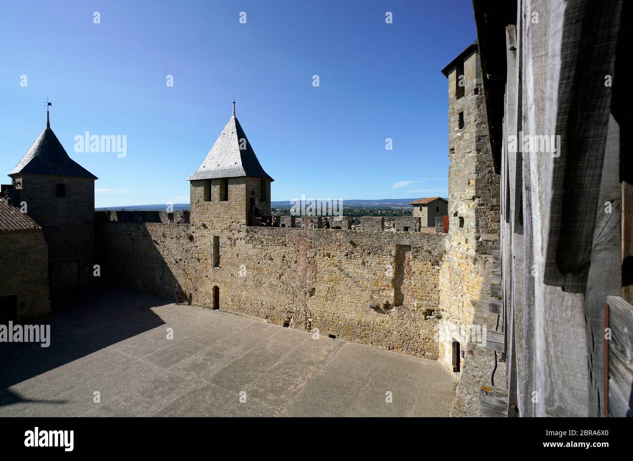 Chateau Comtal (Count's Castle) and courtyard in fortified city of ...