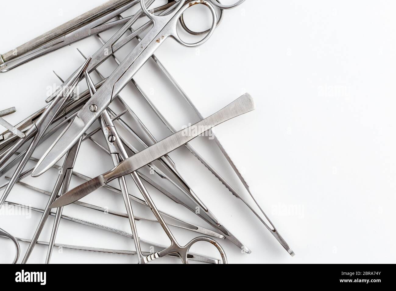 surgical instruments on white isolated background. top view Stock Photo ...