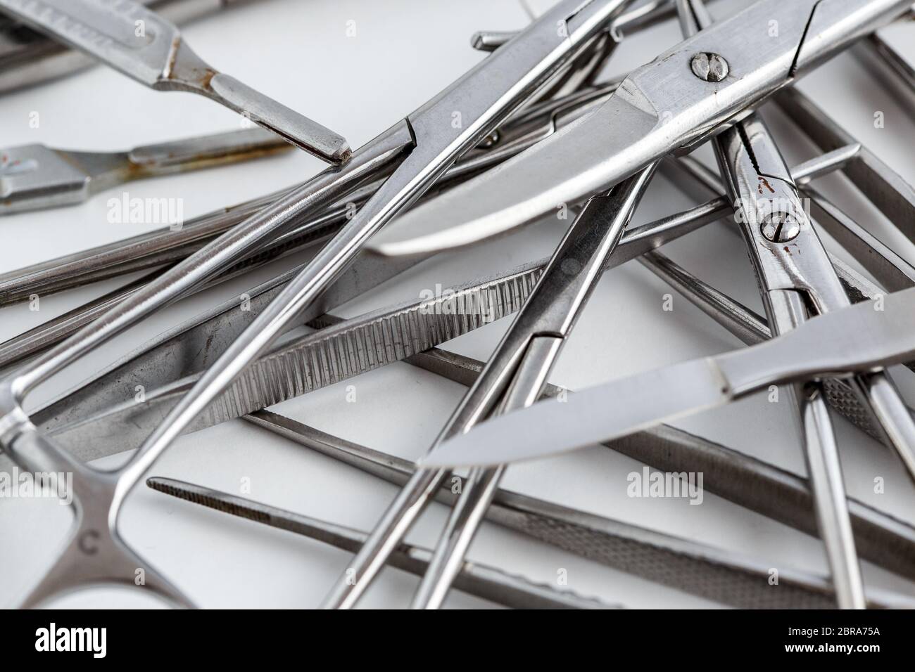 surgical instruments on white isolated background. top view Stock Photo ...
