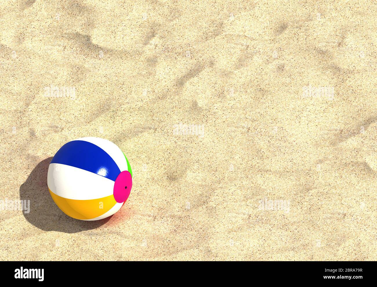A beach ball on a beach in a sunny day Stock Photo - Alamy