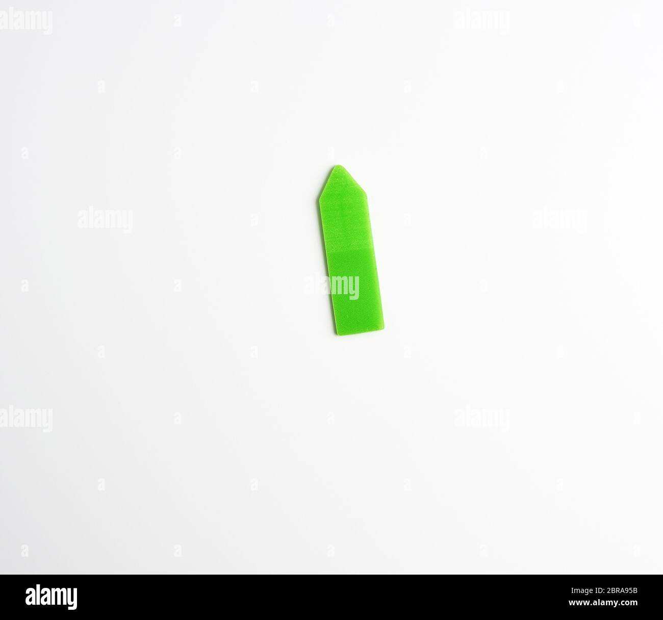 plastic green velcro bookmark for paper on white background, copy space ...