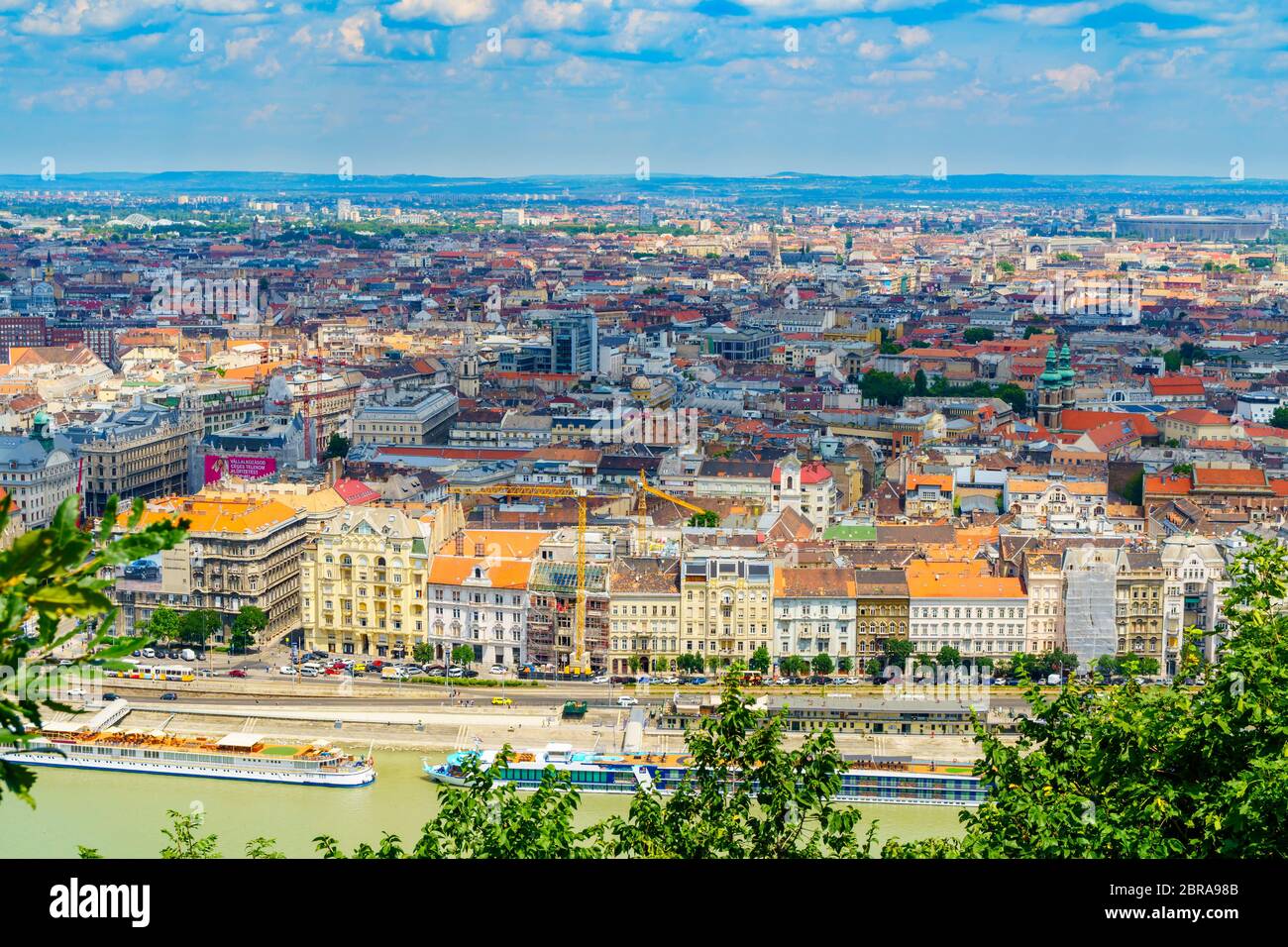 Panorama of Budapest over the Danube river. The bridges destroyed in ...