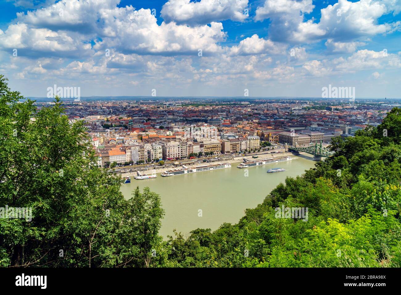 Panorama of Budapest over the Danube river. The bridges destroyed in ...