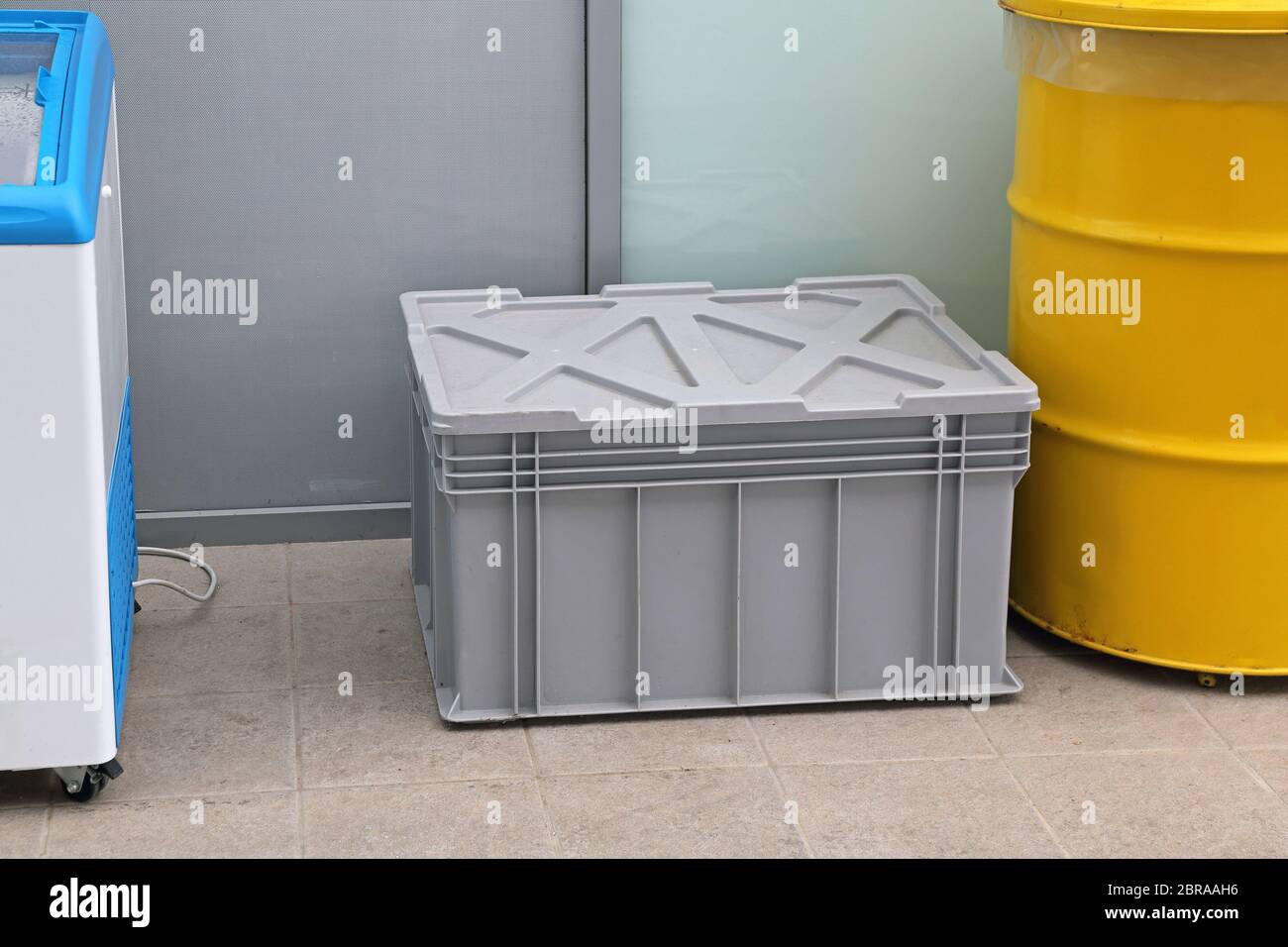 Gray Plastic Transport Box For Shipping Delivery Stock Photo - Alamy